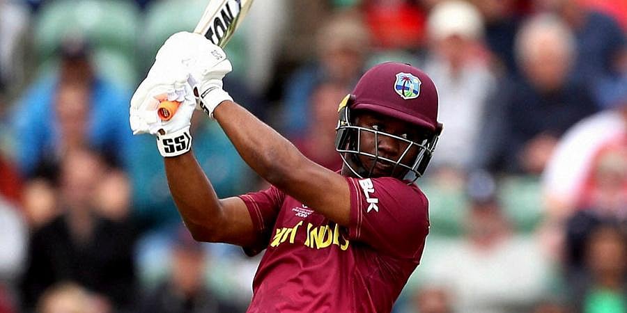 West Indies hit 256-5 and beat Ireland by 62 runs to clinch T20 cricket ...