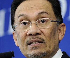 Malaysia's Jailed opposition leader Anwar Ibrahim urges voters to oust ...