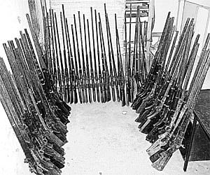 Villagers surrender illegal weapons