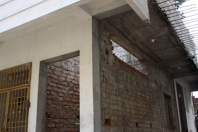 Crisis stalls Housing scheme