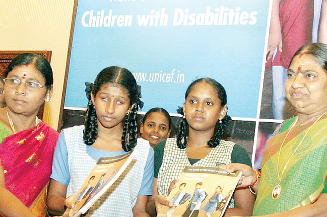 \'Encourage families to care for their disabled children\'
