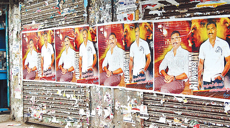 Cops work overtime to clear criminal’s birthday posters