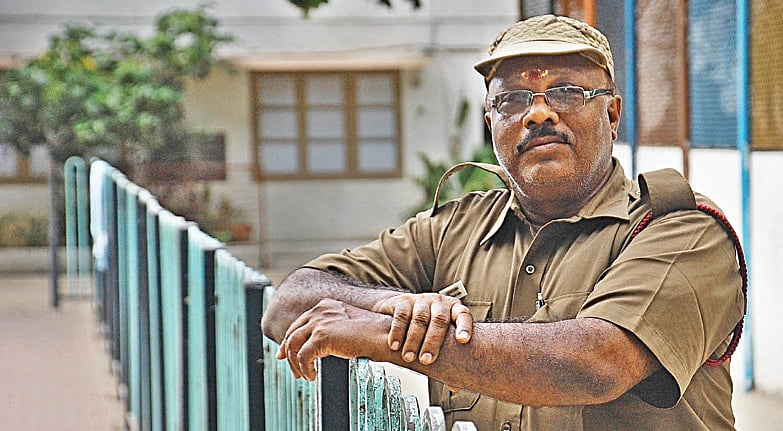 School watchman salutes to honour people he likes most