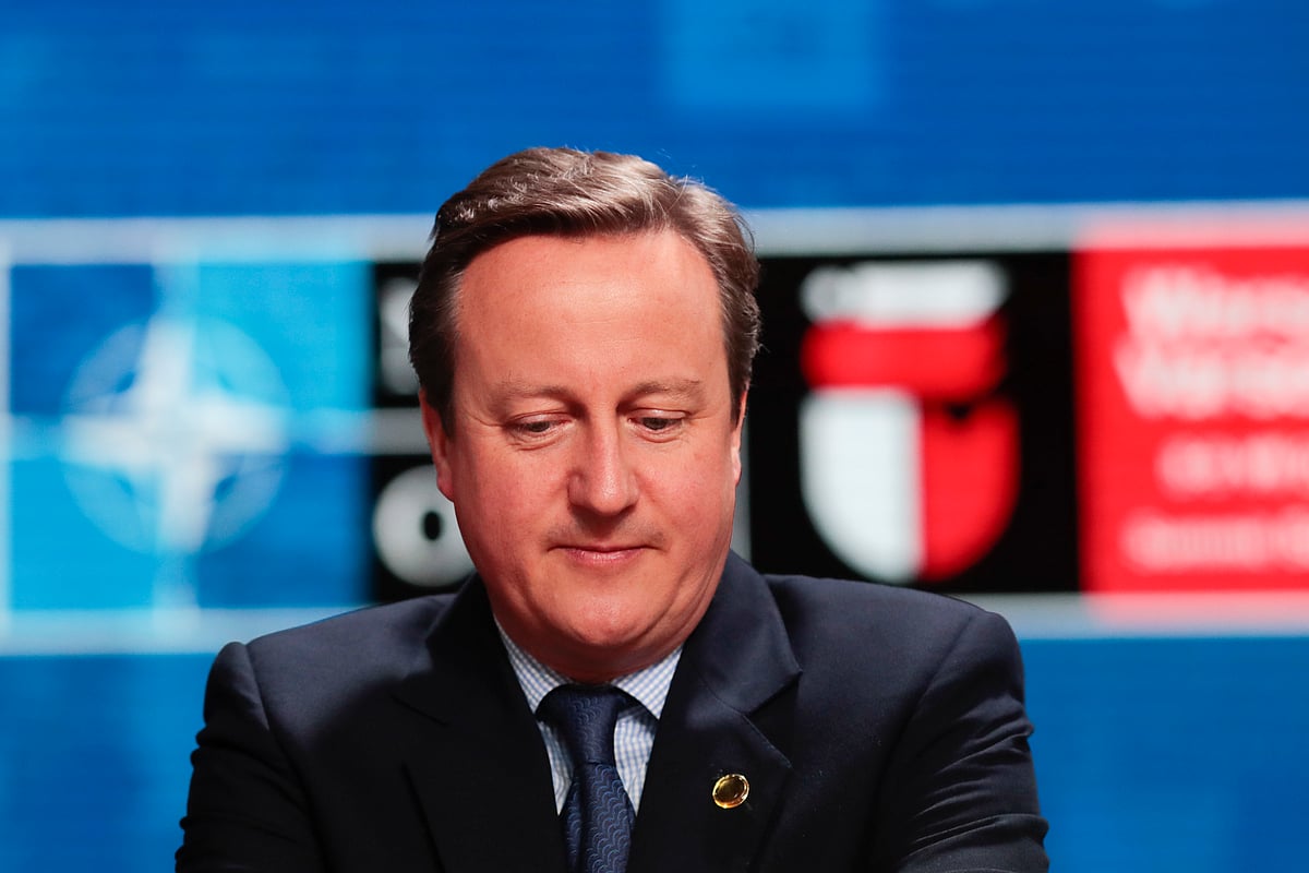 David Cameron sings after announcing departure