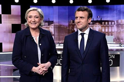 Macron, Le Pen face off as France elects its new president