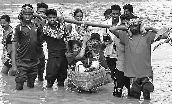Ailing woman taken to hospital in bamboo basket