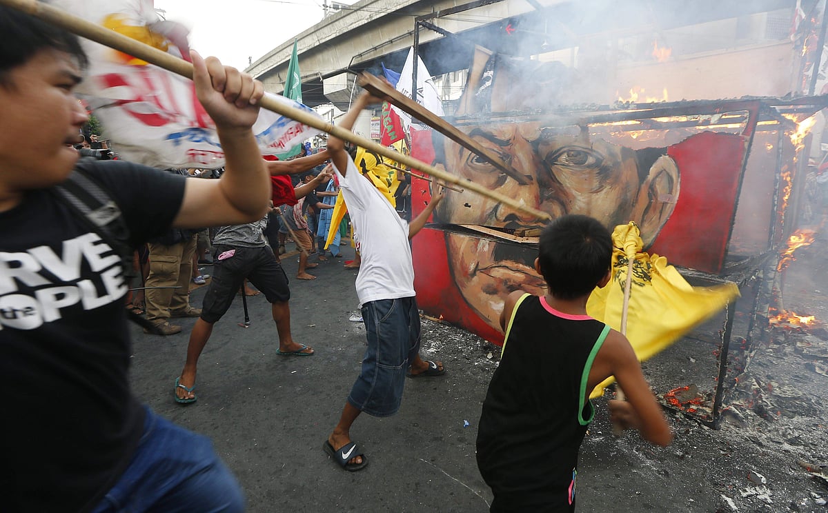 Protestors in Philippines slam martial law, killings under President ...