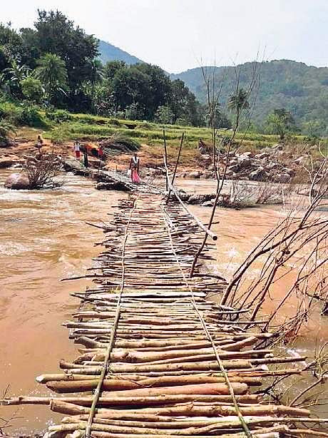 Villagers build temporary bridge