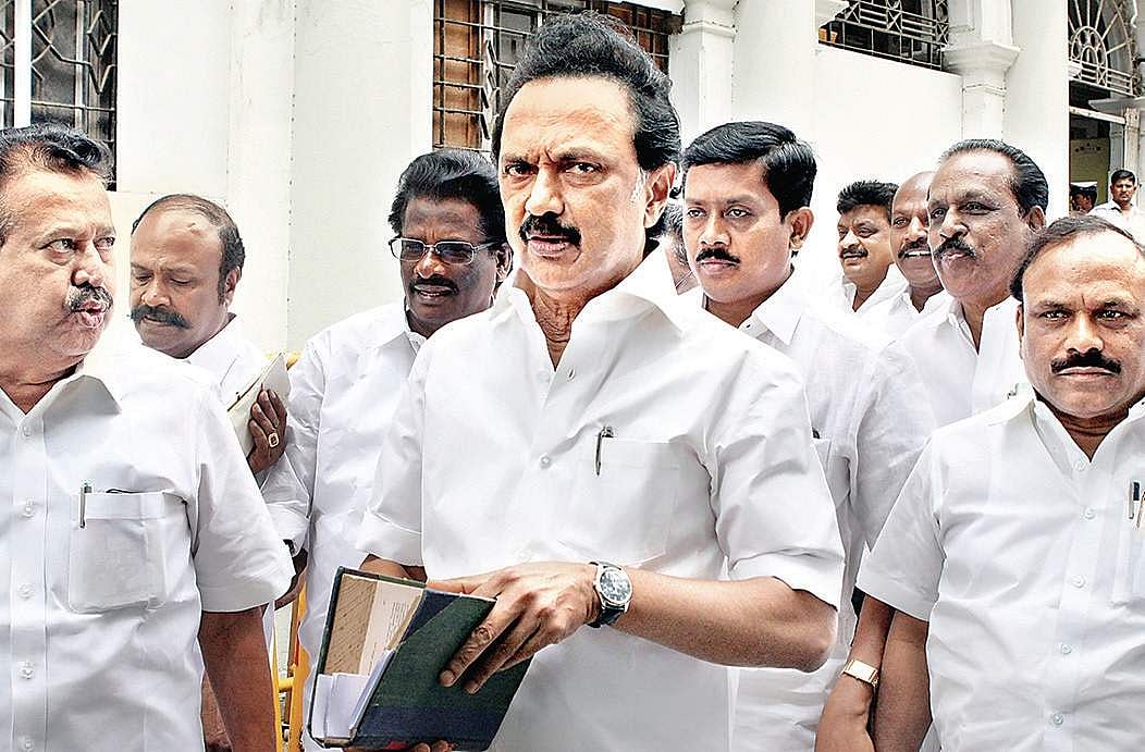 DMK stages walkout over governor’s meetings with government staff
