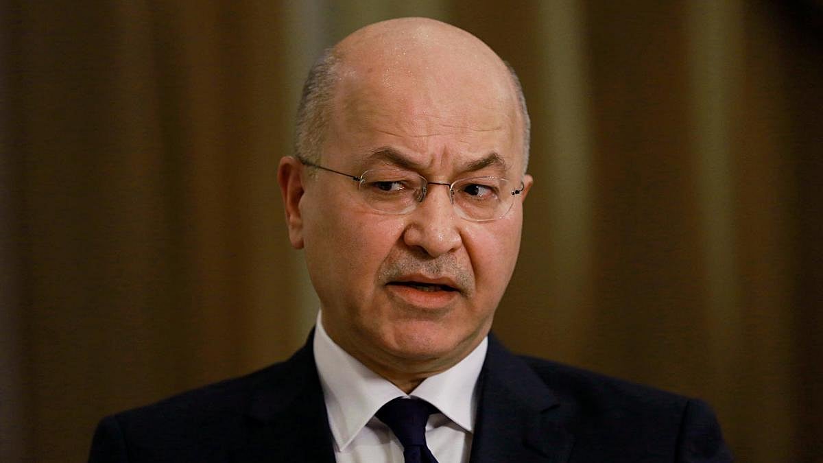 Iraq president Barham Salih threatens to quit over PM pick as protests rage