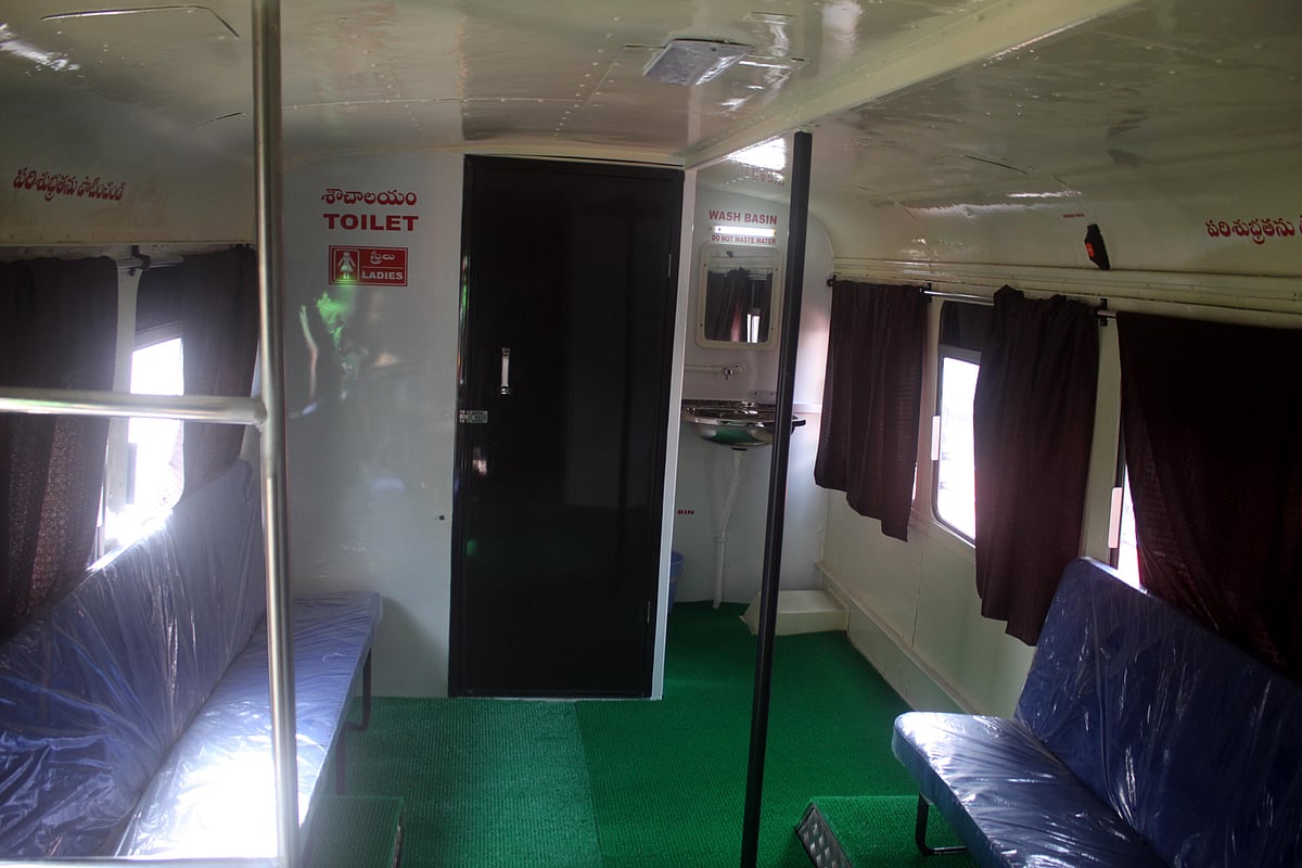 Transport minister unveils new cargo, mobile toilet buses