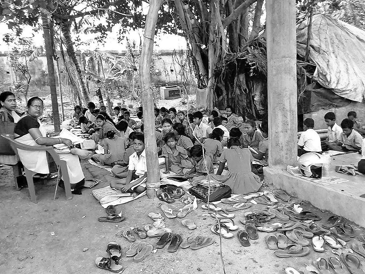 School kids study under trees, open sky in Paradip