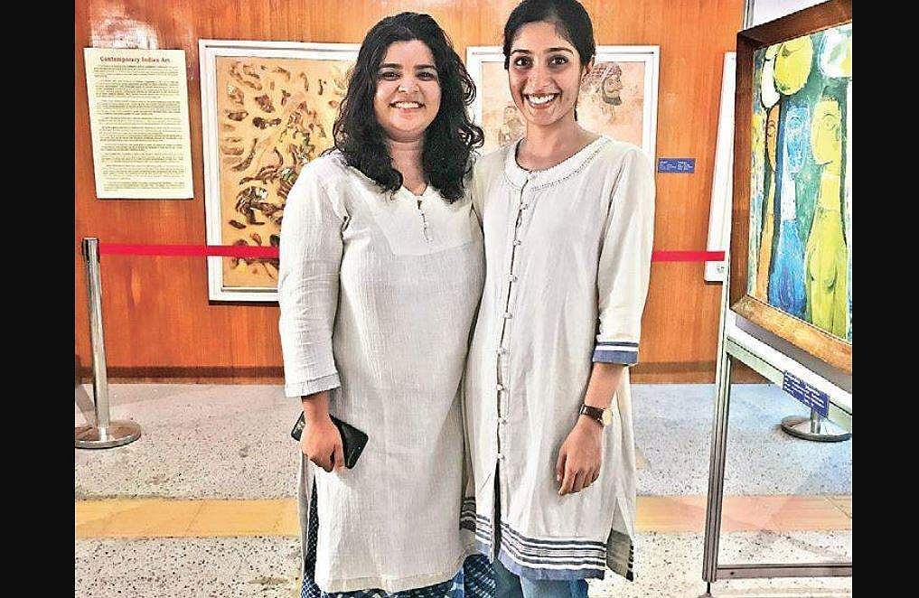 These two young women are making art comprehensible