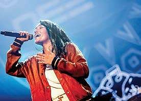 Dee MC raps her way into hearts