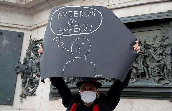 Man charged for 'liking' photo of murdered French teacher