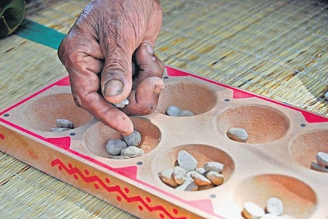 Native Tamil game Pallankuzhi may be losing to the modernities of life