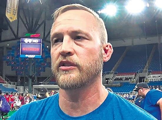 Wrestling coach leaves 'risky' India for USA