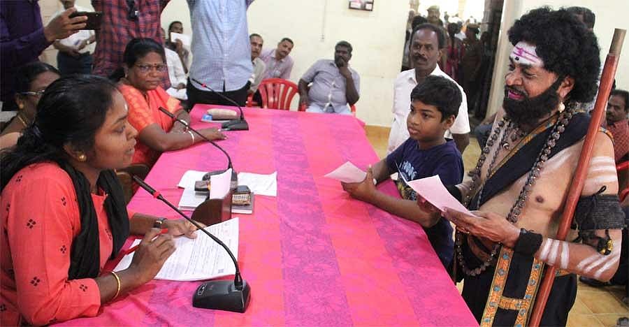 Dressed as Harichandran, folk artiste seeks officials to give a fresh ...