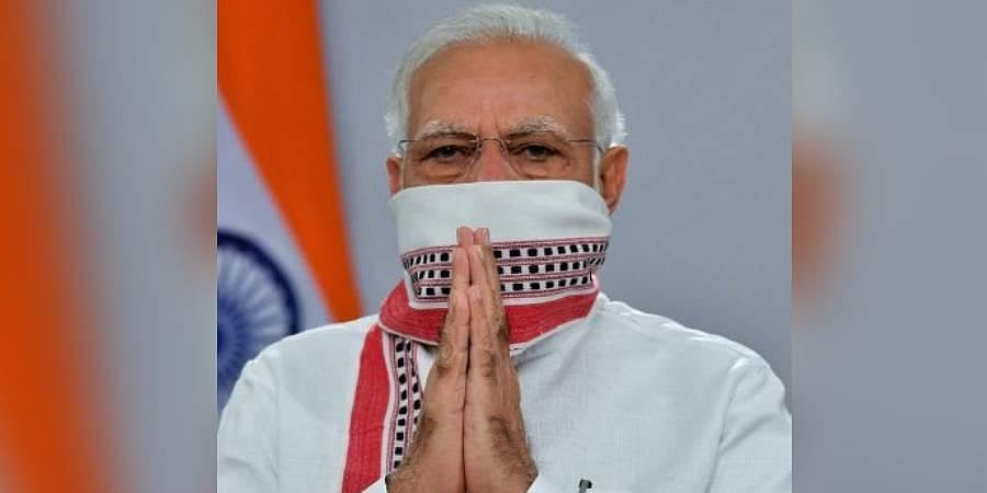 Manipur cheers as Modi uses state's traditional stole as face mask