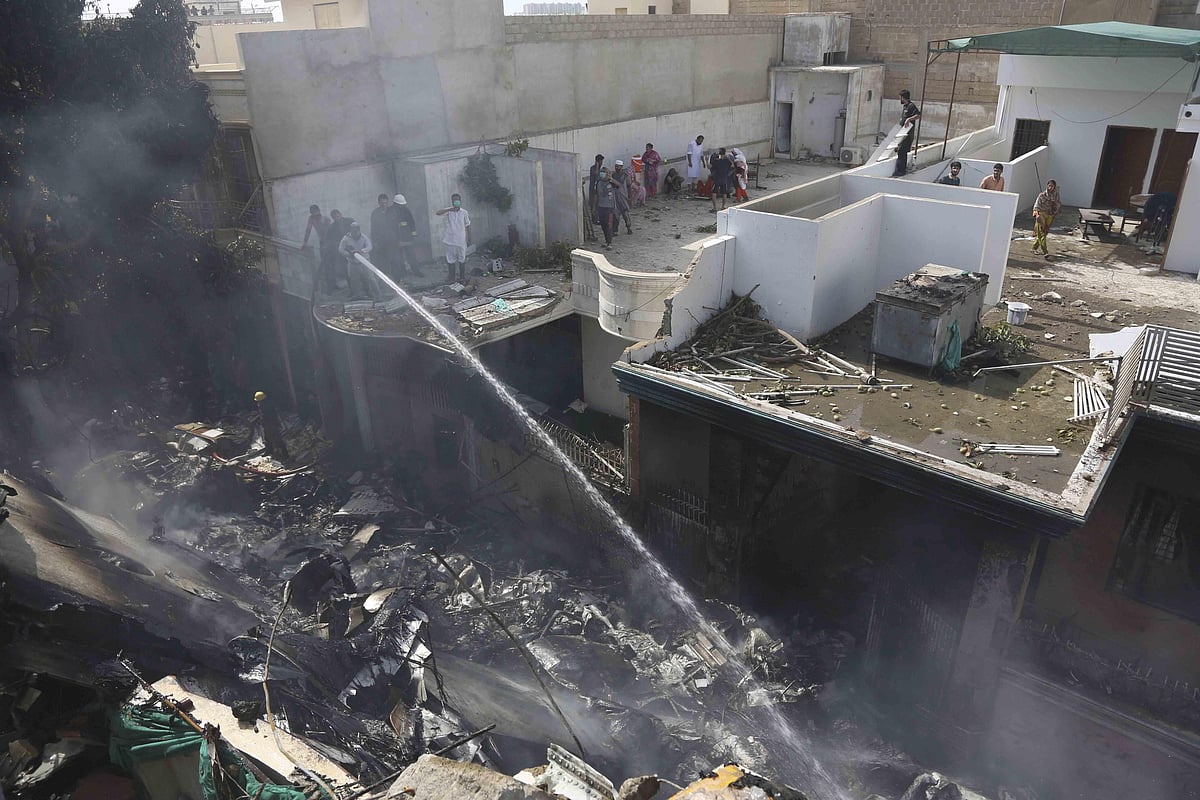Pakistan air crash: Authorities to identify severely charred bodies ...