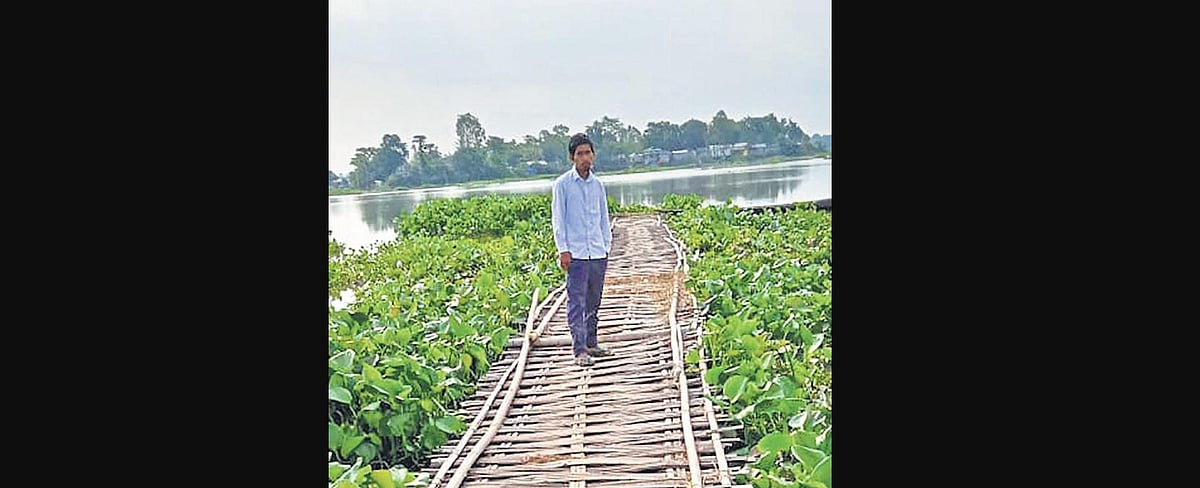 Rowing to close the gap: Assam farmer turns boatman, bridge builder to ...
