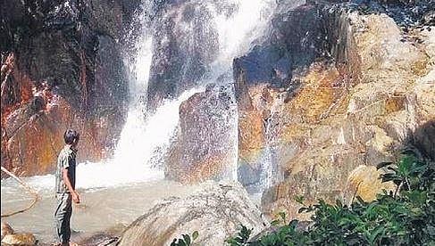 Tourists throng new waterfall near Mandasa
