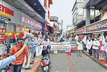 Broadway merchants stage protest demanding removal of barricades