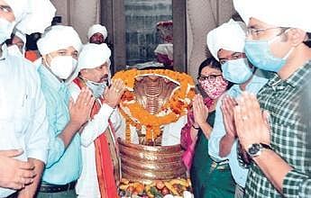 Tribals offer prayers at Nagoba temple