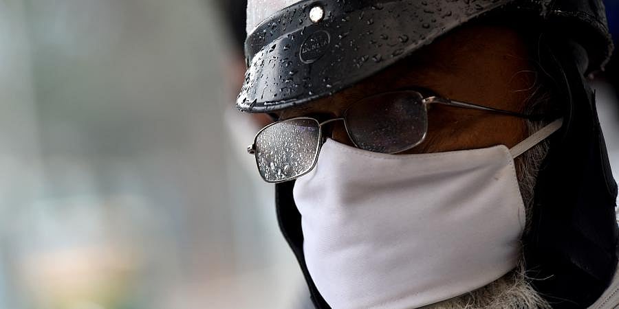 Researchers propose that humidity from masks may lessen severity of ...