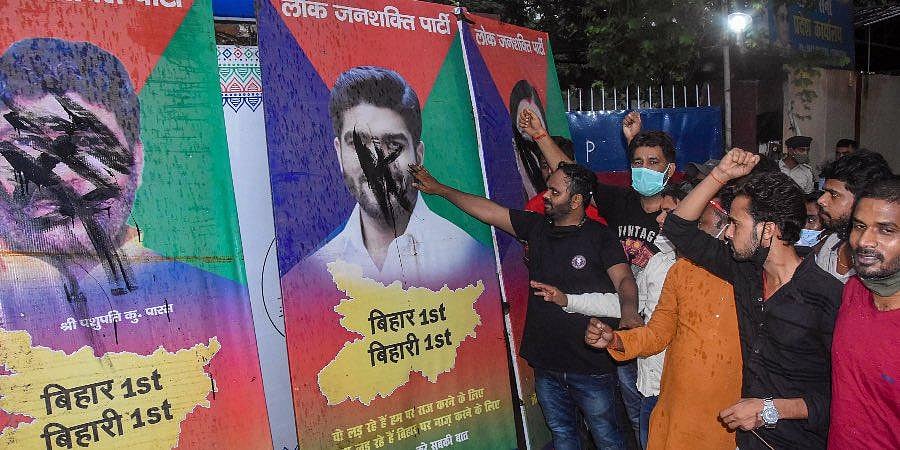 Turmoil outside LJP Bihar headquarters; Chirag Paswan supporters deface ...