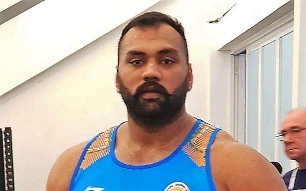 Tajinder punches Tokyo shot put ticket on a day of national records