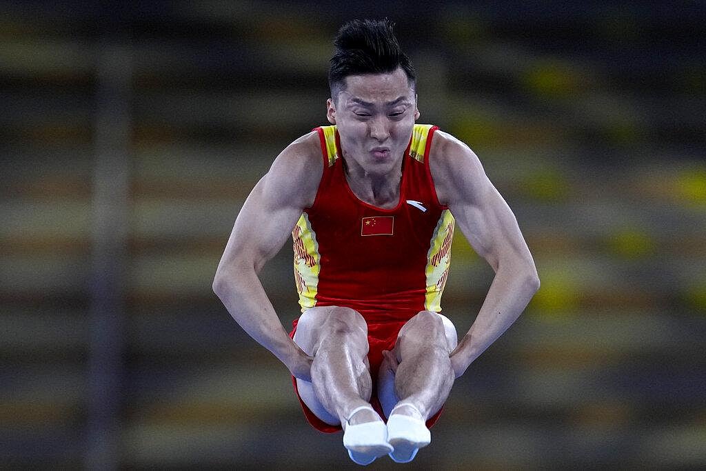 Chinese gymnast Dong Dong makes Olympic history on Tokyo trampoline as ...