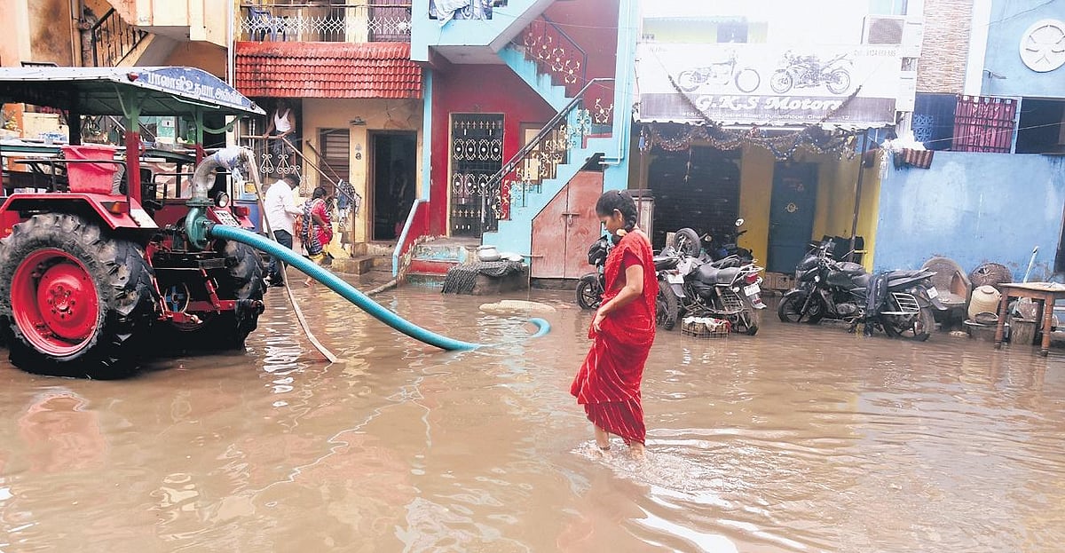 As showers subside, Corporation pumps out water from inundated streets ...