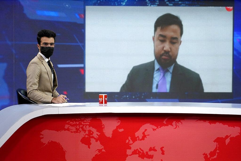 Afghan male TV presenters wear masks in protest against Taliban