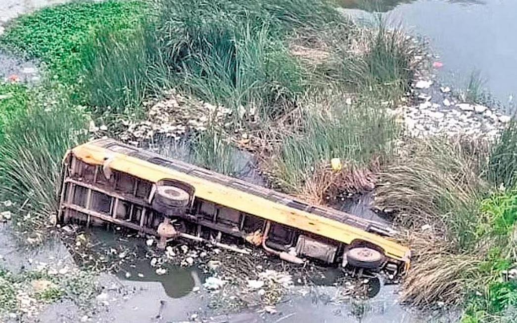 Bengaluru: School bus falls into ditch in Electronic City