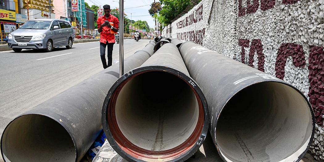 Water pipes take up pedestrian platform near Tiruchy's Chatram bus stand