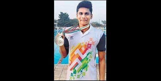 Danush makes big splash in state aquatic championships