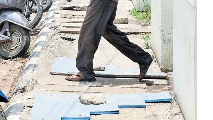 Replace broken slabs covering drains, Tiruchy residents urge Corp