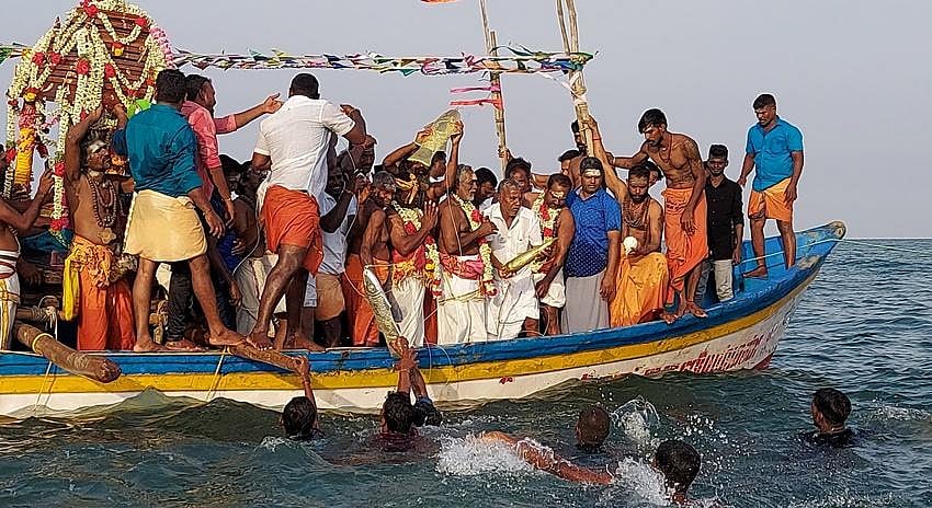 'Fish idols' dipped in sea as part of age-old Nagai festival