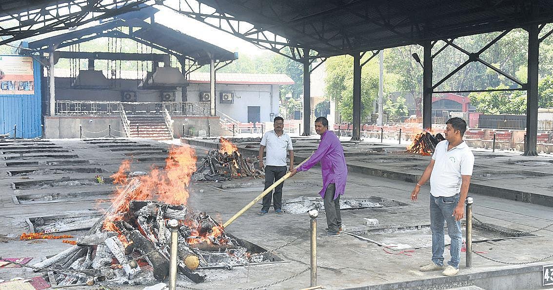 Ashes get washed away during cremation in Kooraikundu village