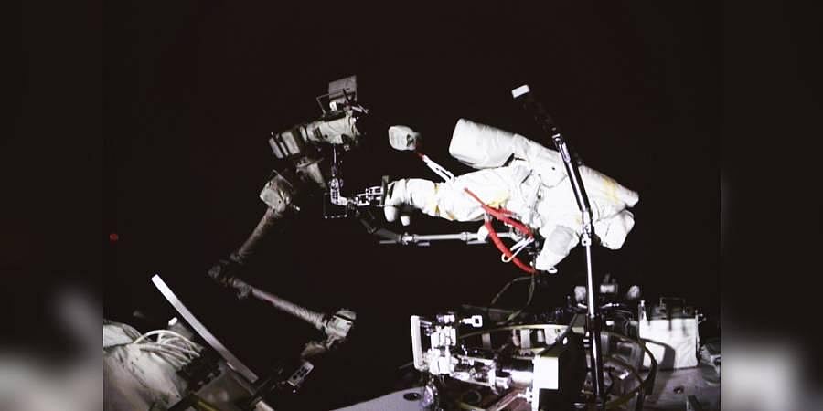 Chinese astronauts go on spacewalk from new station
