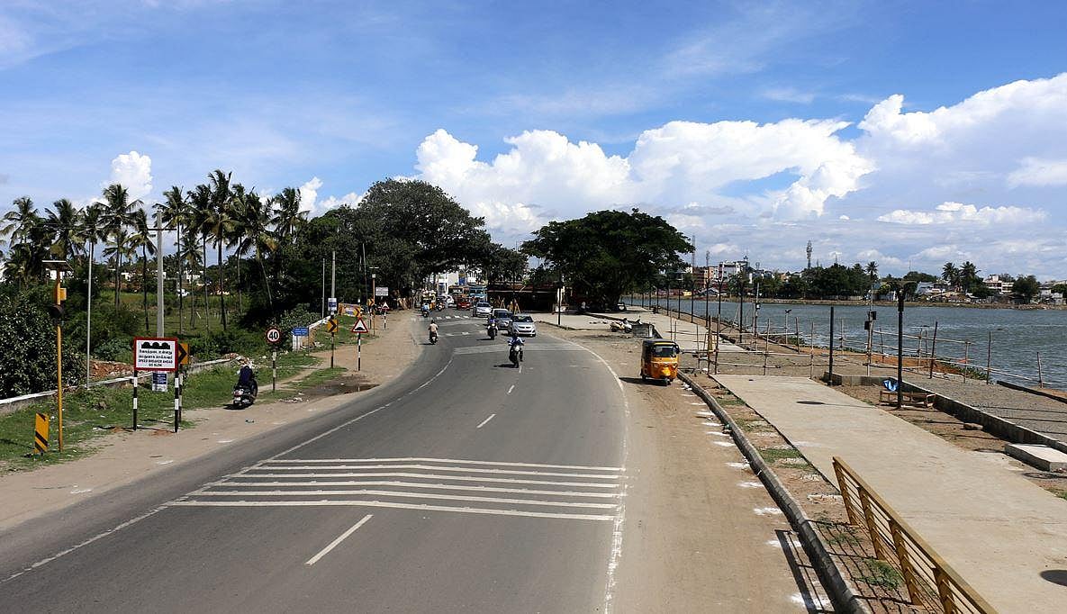 CCMC conducts feasibility study to widen Pollachi road near Kurichi lake