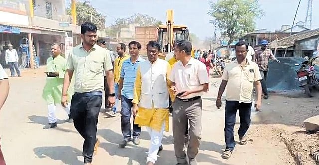 NHAI official made to walk 2 km on tattered road