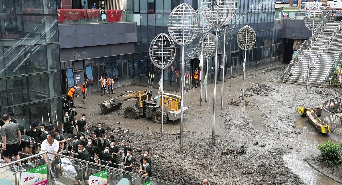 Death toll in recent Beijing flooding rises to 33, with 18 still missing