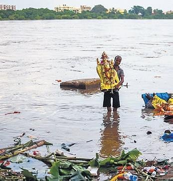 Odisha: Pollution norm on idol immersion goes down Kuakhai river