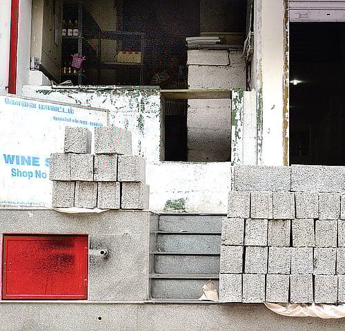 TASMAC Shops Face Brunt of Bldg Owners