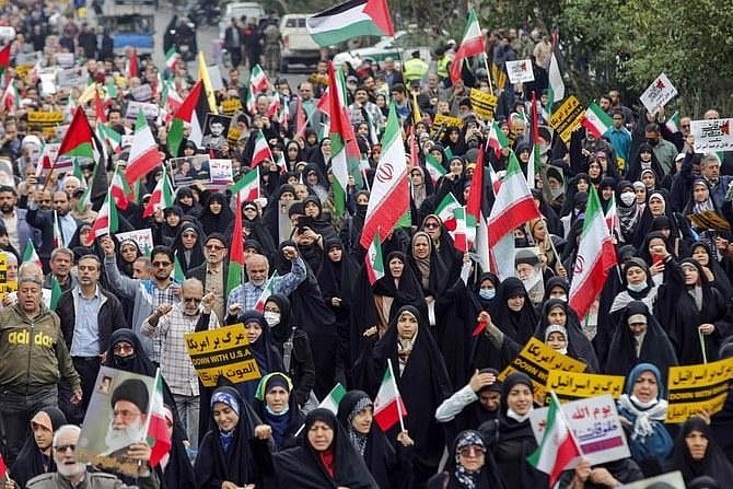 Israel-Hamas war LIVE: Thousands of Iranians rally in support of Gaza ...