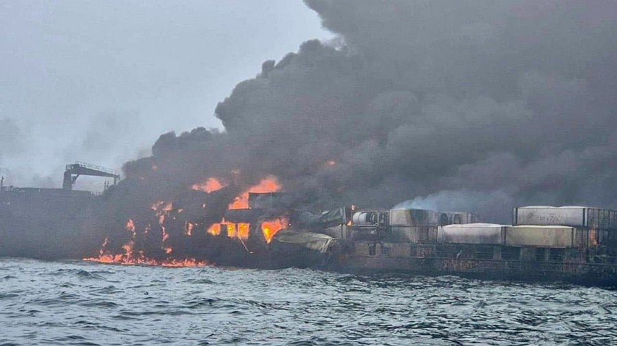 Tanker hired by US military ablaze off UK after container ship allision