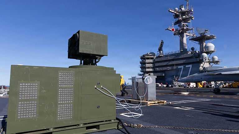 Technology firm reports test firing of laser from aircraft carrier