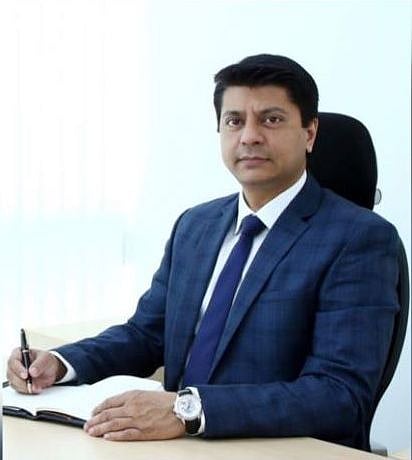 How Market Coupling Can Make Multiple Power Exchanges Competitive